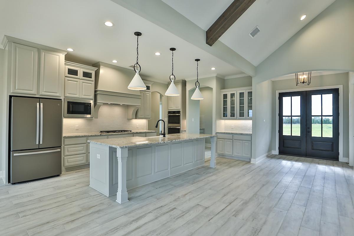 Custom Home Builder North Houston - Build On Your Land | RVision Homes